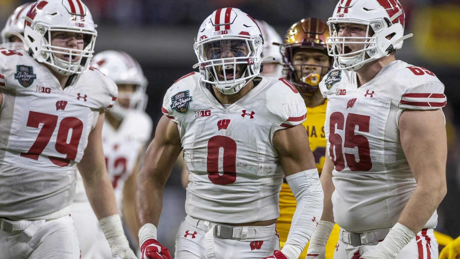 Wisconsin Badgers put out of game early in 52-21 loss at #3 Ohio State ...